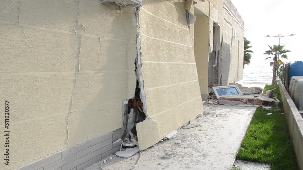 Collapsed and destroyed building ruins after earthquake, closeup ...