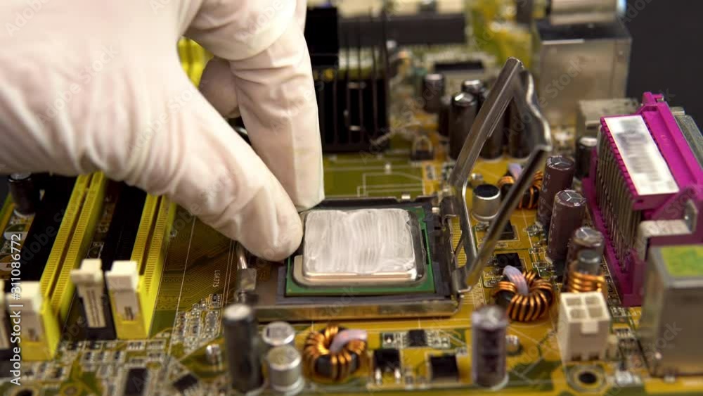 Inserts a central processor onto the motherboard. The processing system ...