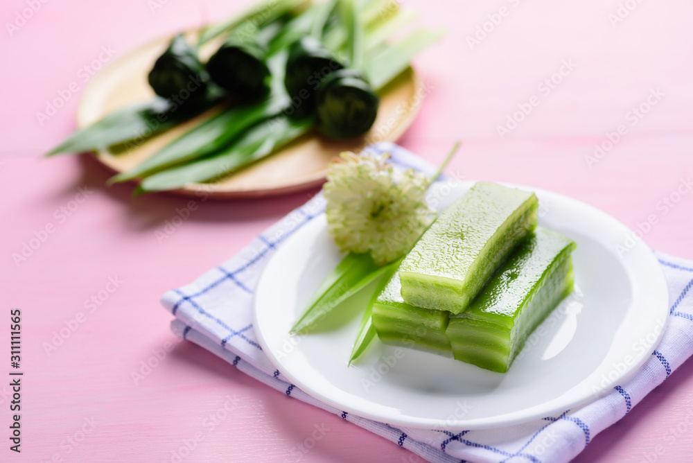 Thai dessert (Khanom chan), steamed layer sweet cake with pandan flavor ...