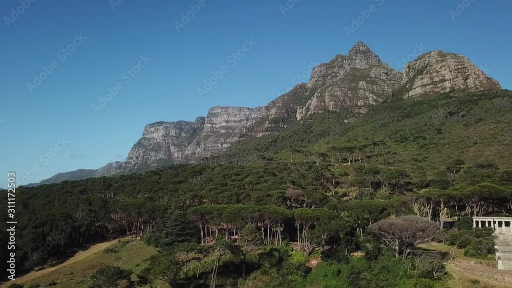 4K aerial summer sunny morning footage of beautiful green Devil's Peak ...
