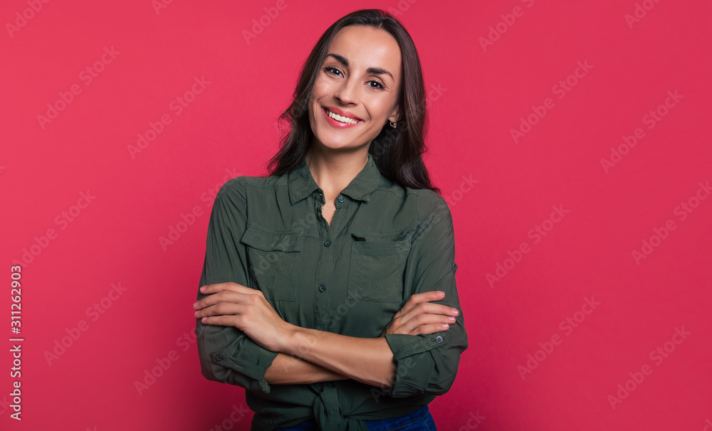 A real knockout. A modern business woman in a khaki shirt and blue ...