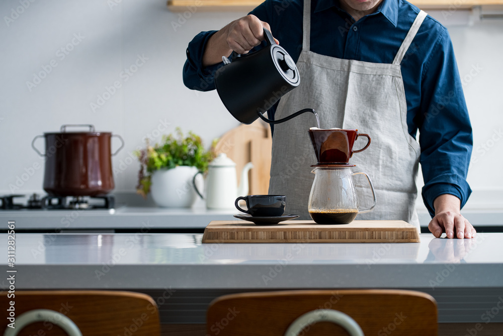 Making coffee in the kitchen Stock Photo | Adobe Stock