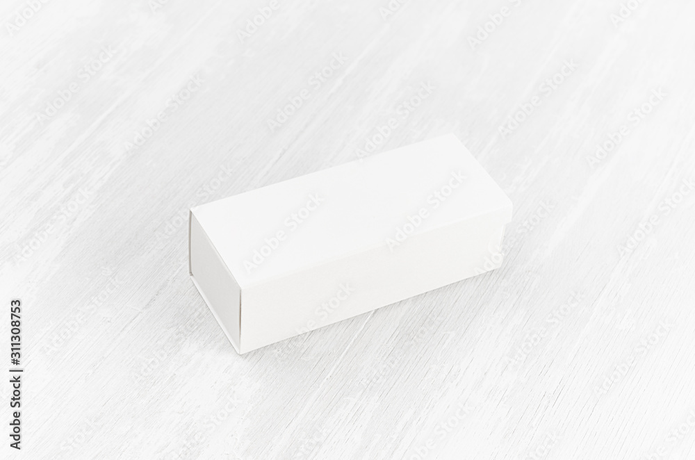 White blank closed paper rectangle box mock up on soft light white wood ...