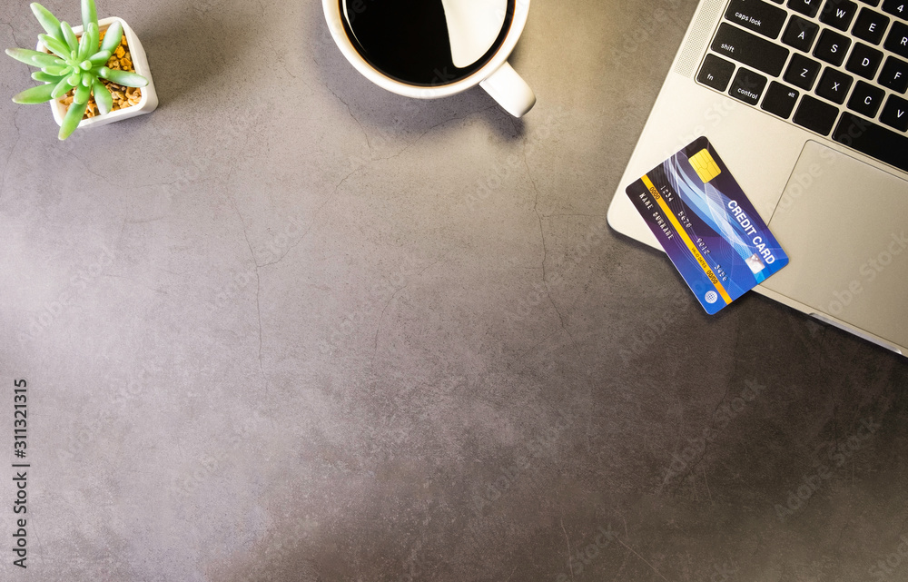 Flat lay, Workspace office desk table with laptop, coffee cup, credit ...