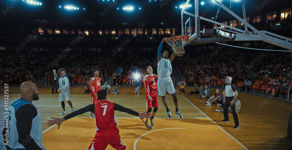 Basketball players on big professional arena during the game. Tense ...