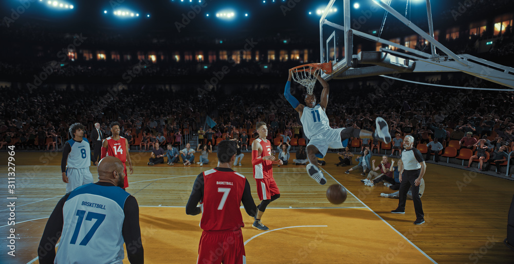 Basketball players on big professional arena during the game. Tense ...