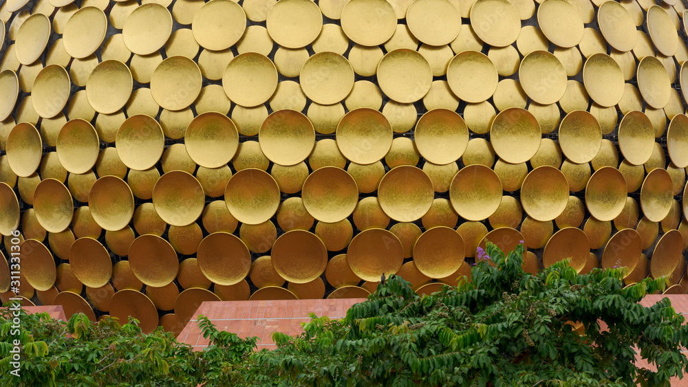 Outer casing made of golden circle plates of Matrimandir in Auroville ...