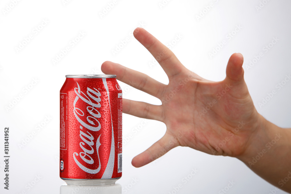 hand reaching coca cola can drinks Stock Photo | Adobe Stock