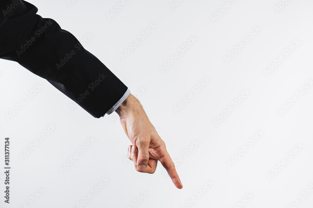 Business concept: hand pointing down. Symbol of going down, recession ...