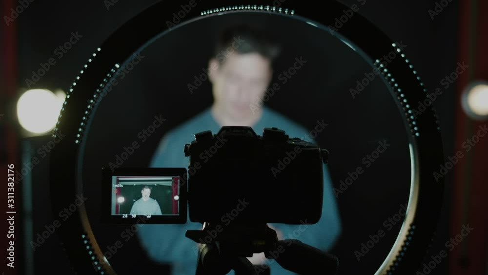 Male Social Media Channel Influencer Filming episode at home studio.A ...