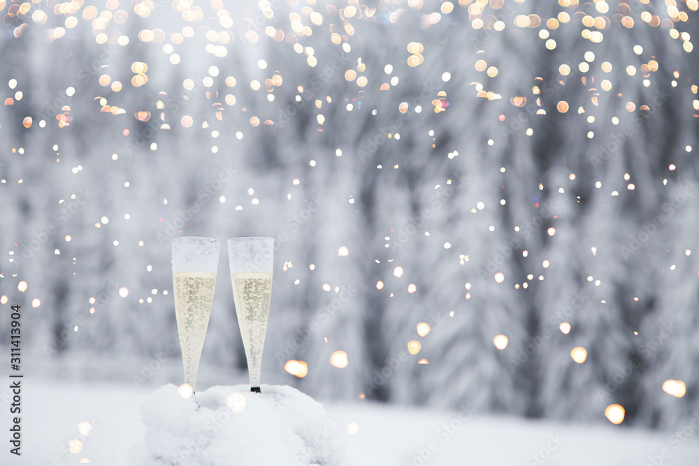 Champagne glasses in winter wonderland snow Stock Photo | Adobe Stock