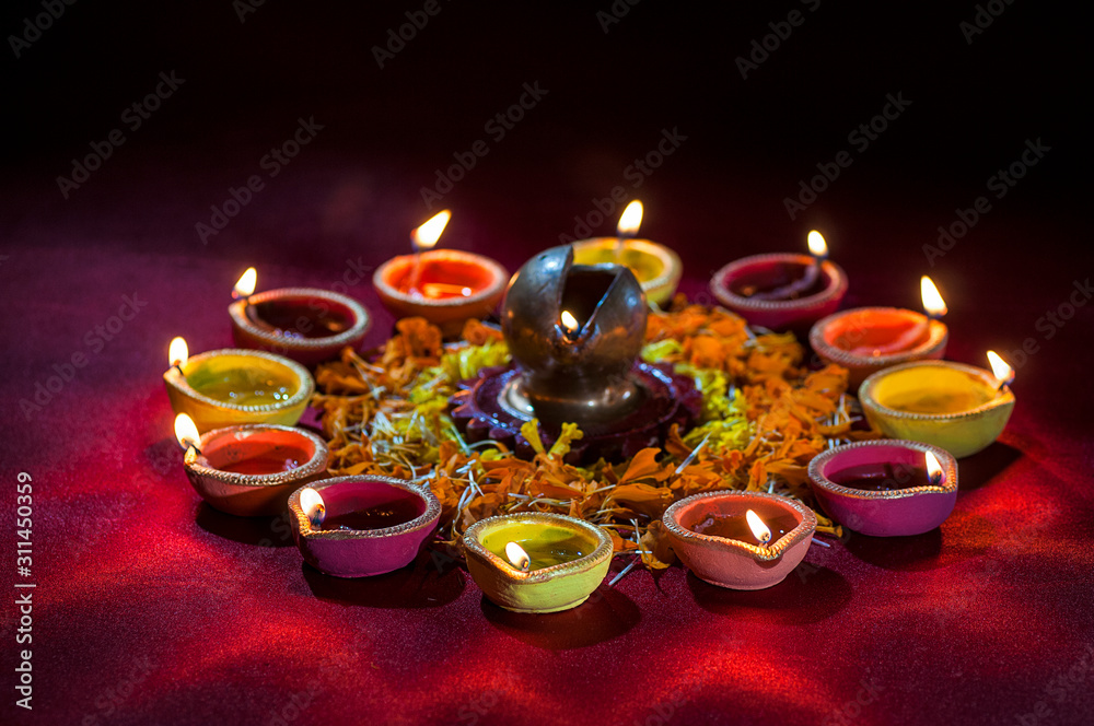 Clay diya lamps lit during Diwali Celebration. Greetings Card Design ...