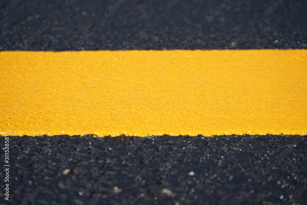 The yellow traffic line during construction is completed Stock Photo ...