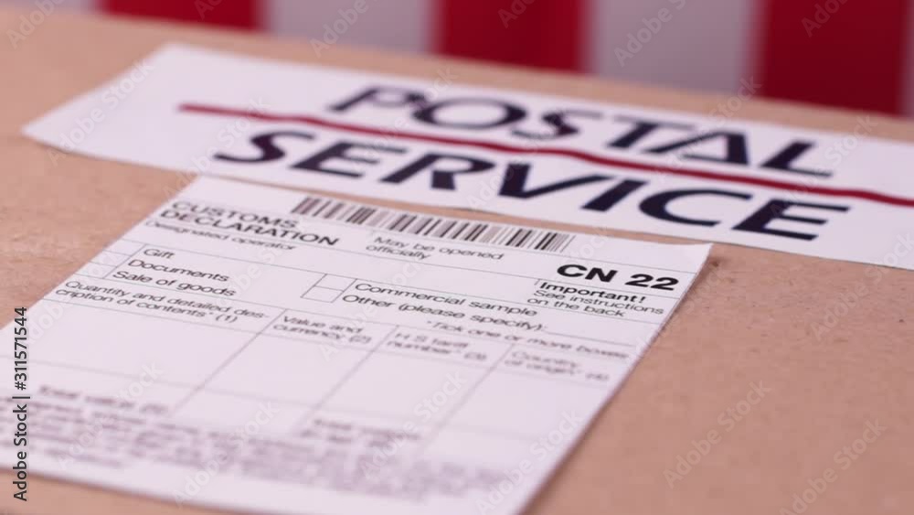 Parcel with a label and Customs declaration form CN22 on a American ...