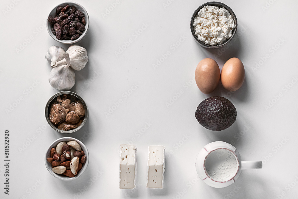 Set of foods that are rich in calcium on a white background. Food is a ...