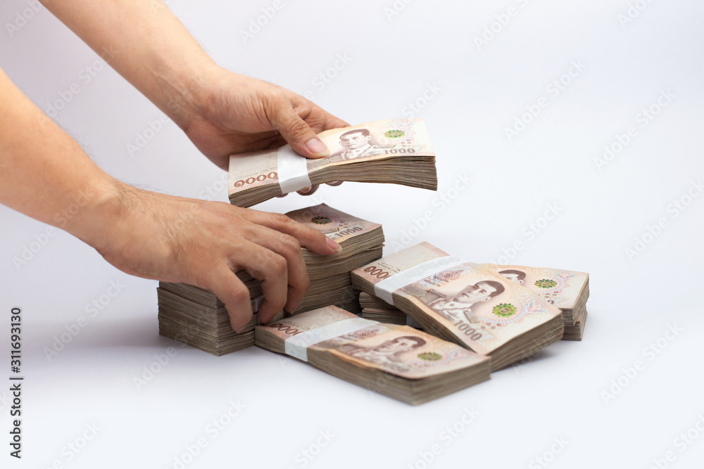 hand holding and counting baht banknote, Stacked of cash 1,000 baht ...