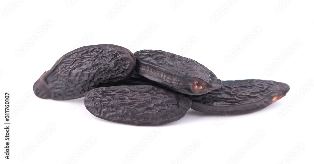 Tonka beans isolated on white background. Bean of Dipteryx odorata ...