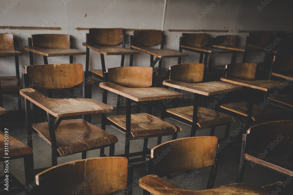 selective soft and blur focus.old wooden row lecture chairs in dirty ...