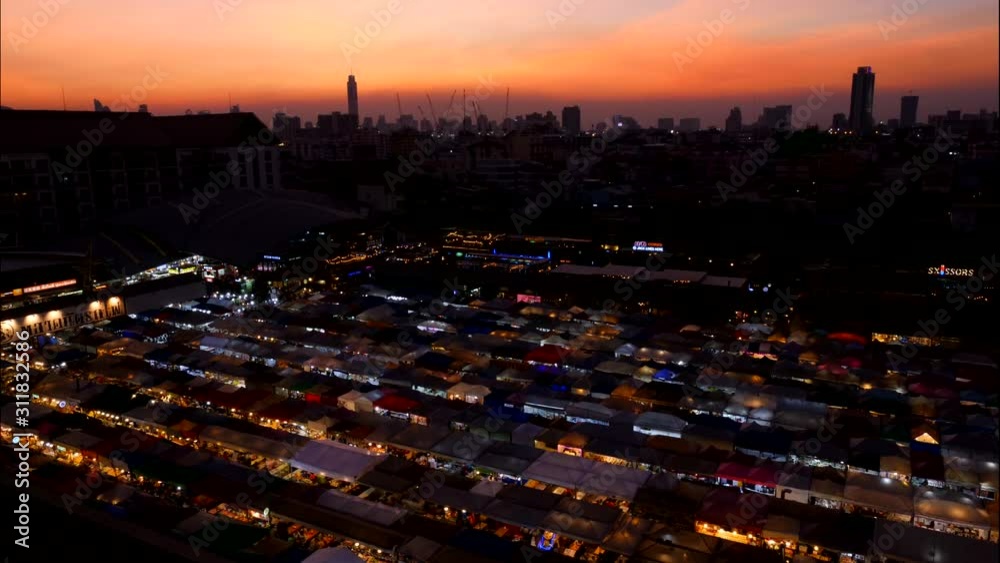 Sunset over Ratchada Rot Fai train market, Most Famous Night Market in ...