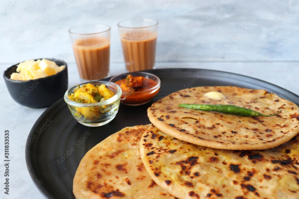 Indian Food - Aloo Paratha or Indian Potato stuffed Flatbread. Served ...