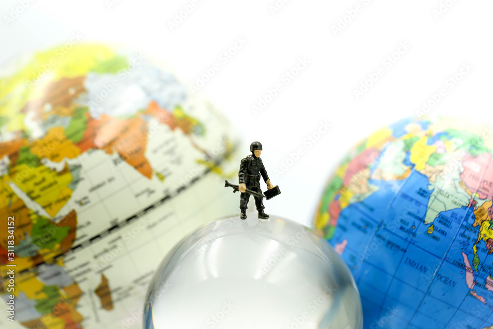 Miniature people : soldiers team with world map,War, army, military ...