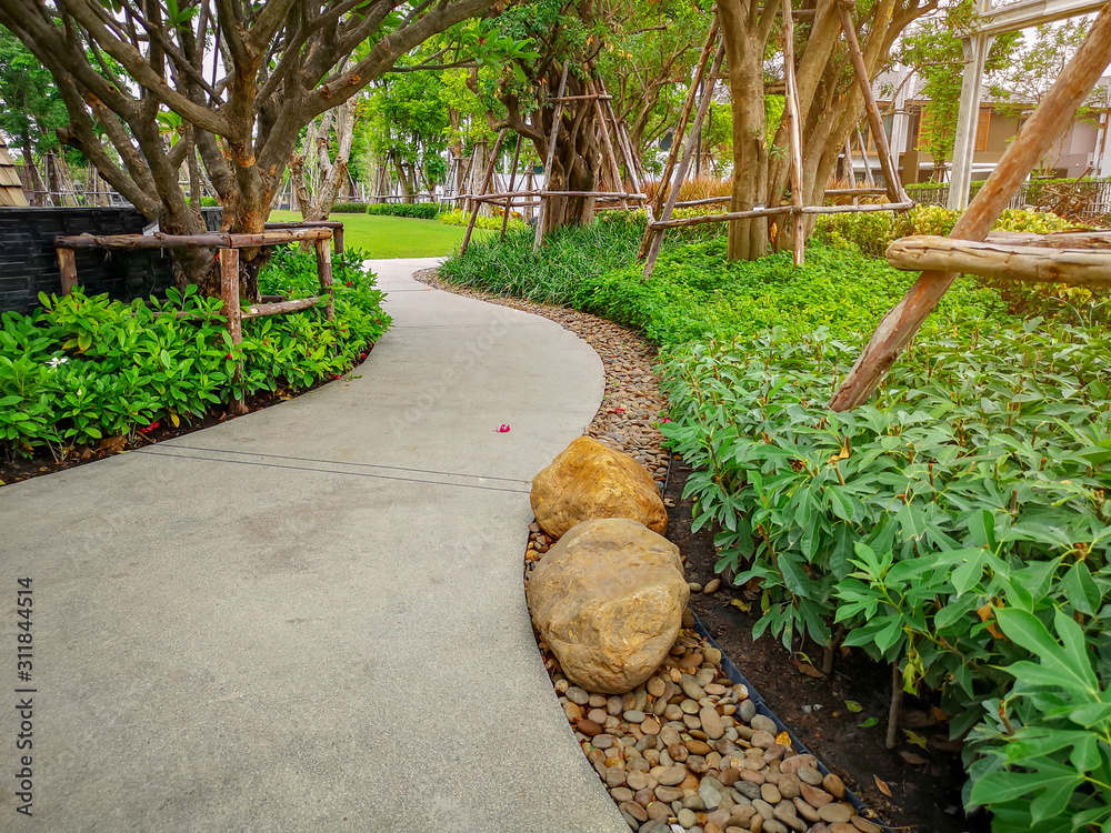gray curve pattern walkway, sand washed finishing on concrete paving ...