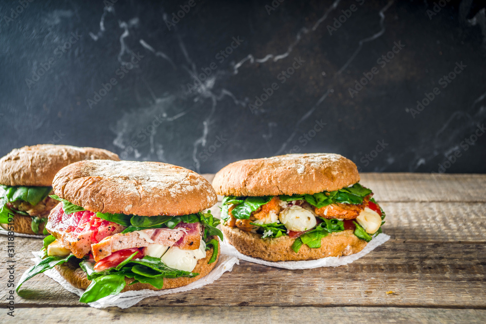 Various seafood and fish burgers assortment. Homemade healthy burger ...