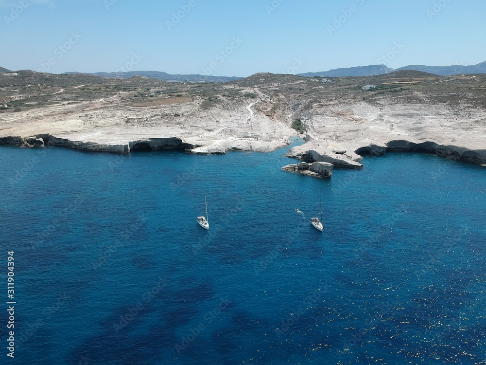 Milos, Greece Papafragas Beach and Caves view from the drone with ...