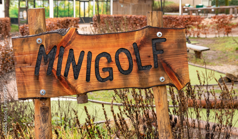 Sign wtih the text 'minigolf'. here you can play a smaller version of ...