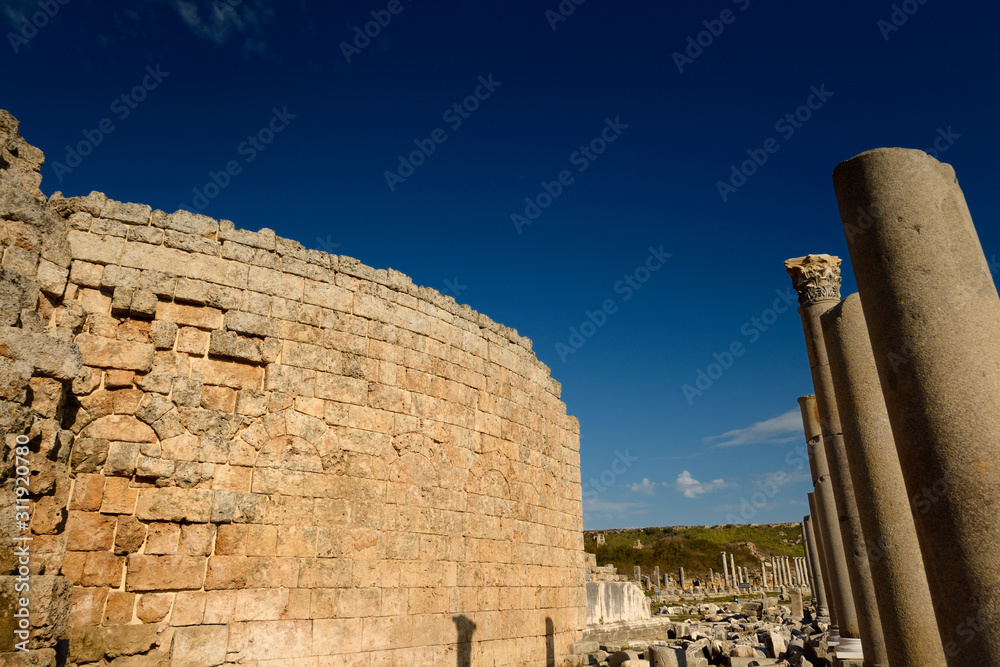 Main street colonade with water canal from Greek Gate with collection ...
