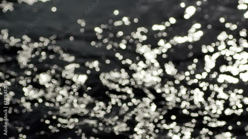 Sunlight reflections off surface of sea water as loop-able motion ...