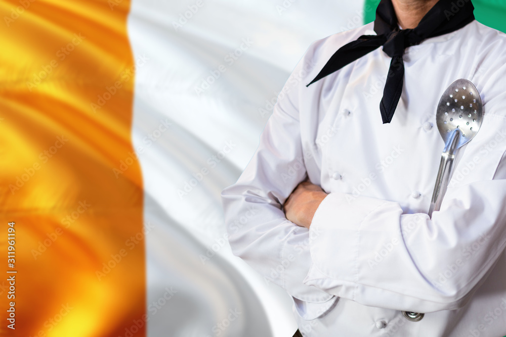 Cote D'Ivoire domestic food concept. Professional chef in white uniform ...
