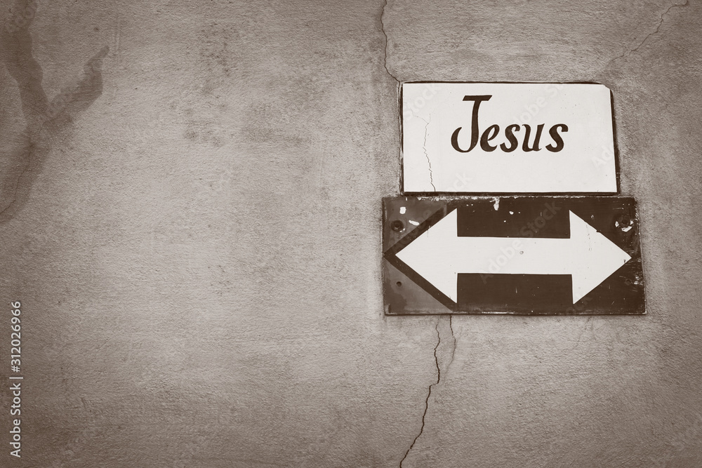 Jesus arrow sign on cracked wall Stock Photo | Adobe Stock