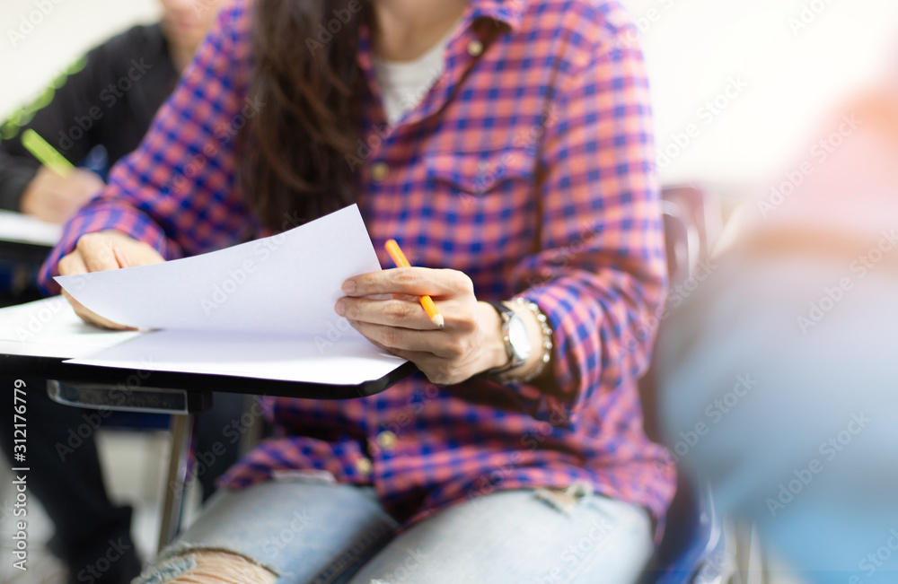 high school,university student study.hands holding pencil writing paper ...