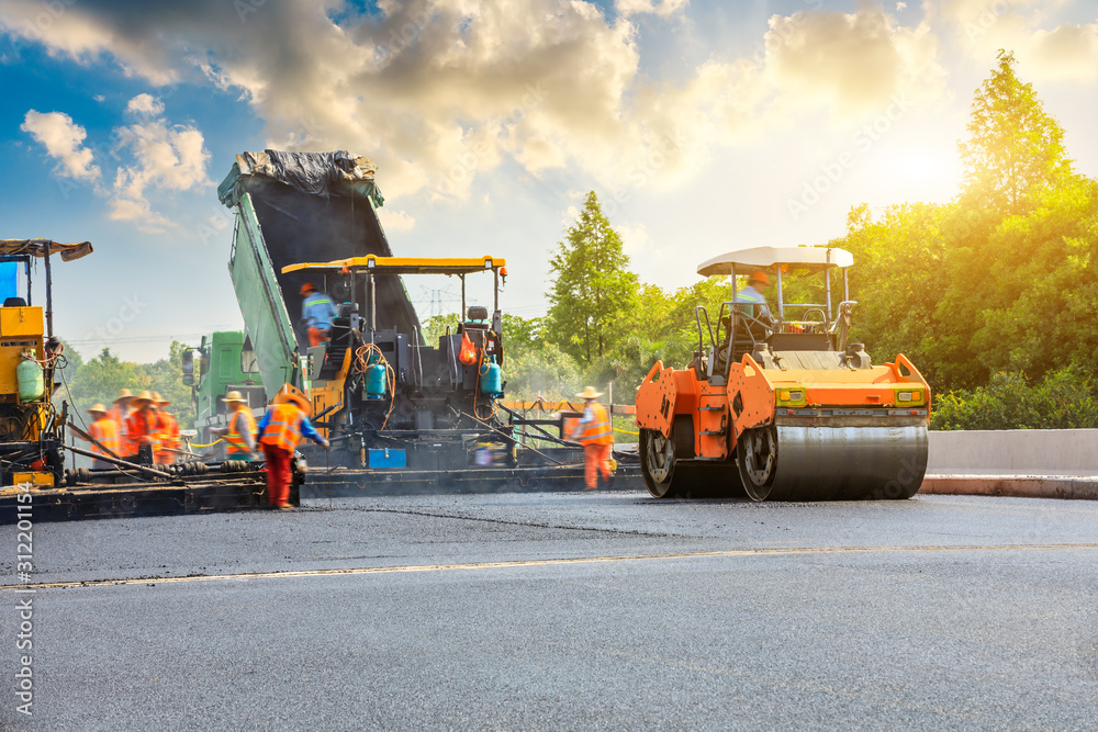 Construction site is laying new asphalt road pavement,road construction ...