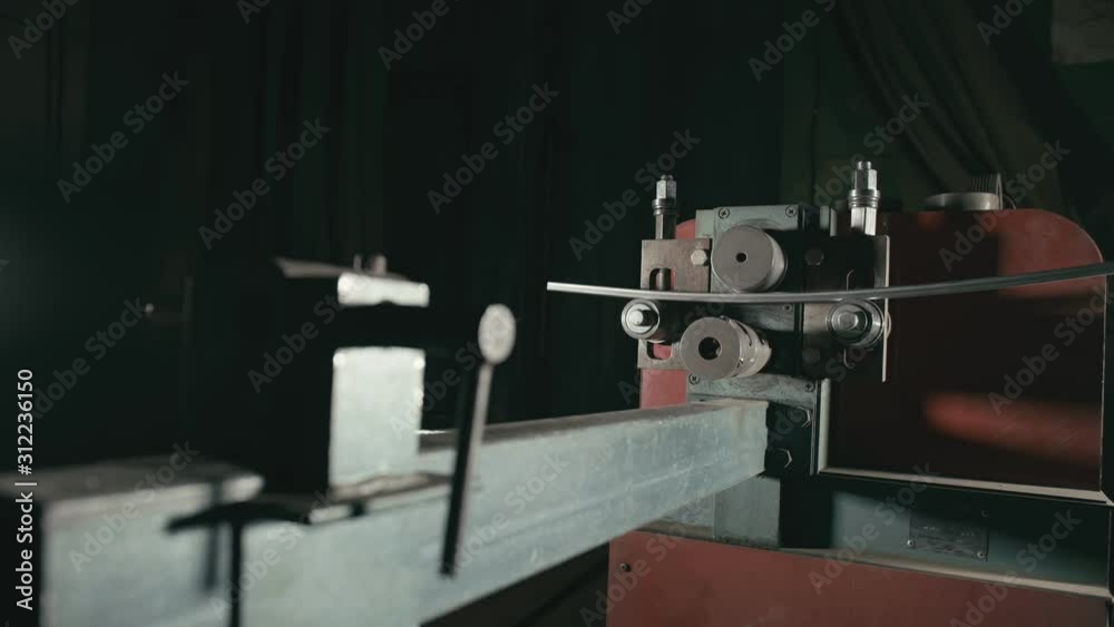 Forge workshop on table. Smithy manual production. Worker bends the ...