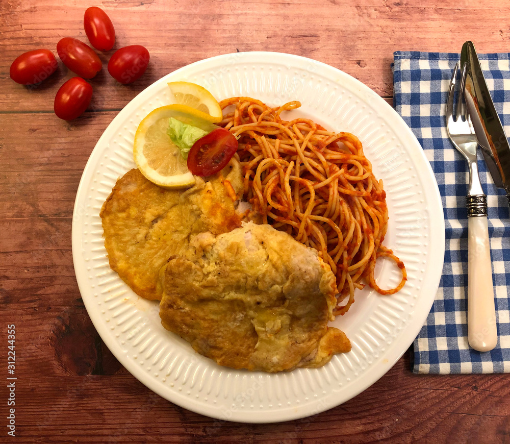 Chicken Piccata. Chicken breast cutlets, breaded with flour, egg, mixed ...