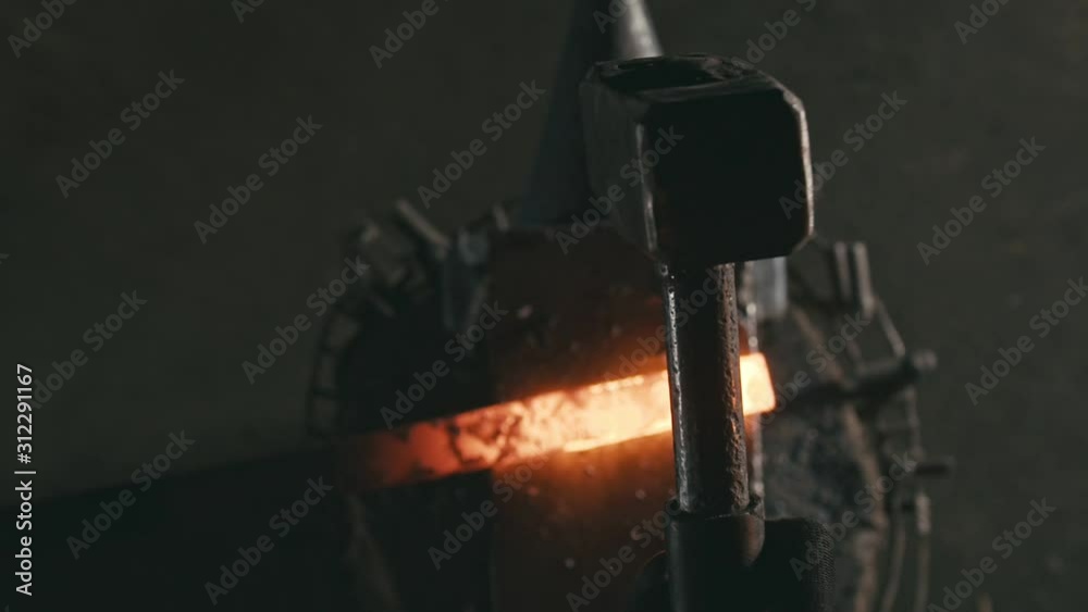 Forge workshop. Smithy manual production. Hands of smith with hammer ...