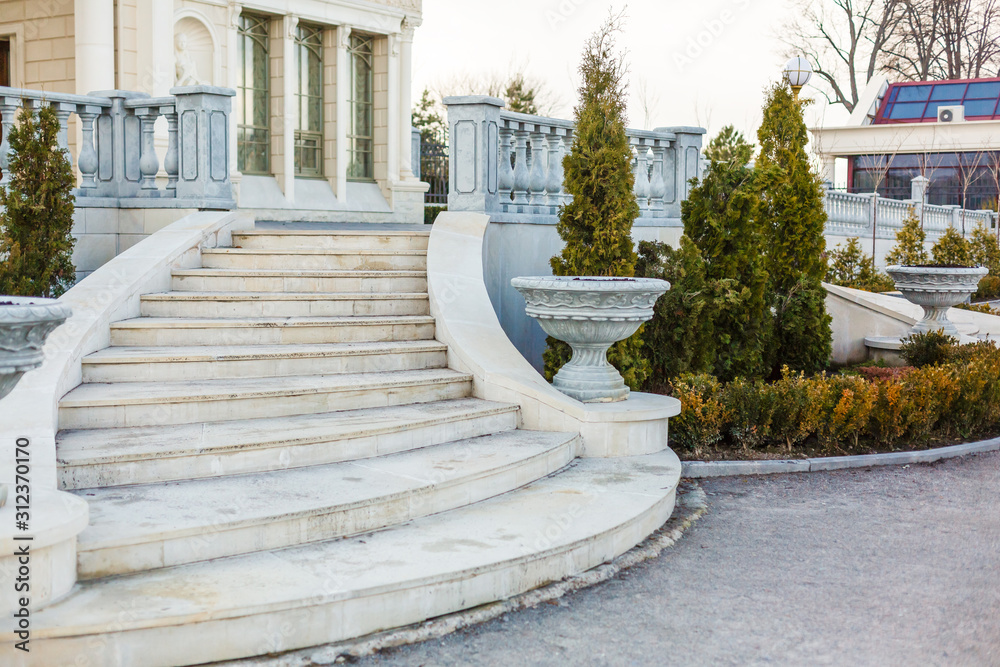 Luxury mansion with marble staircase, white stone balustrade and park ...