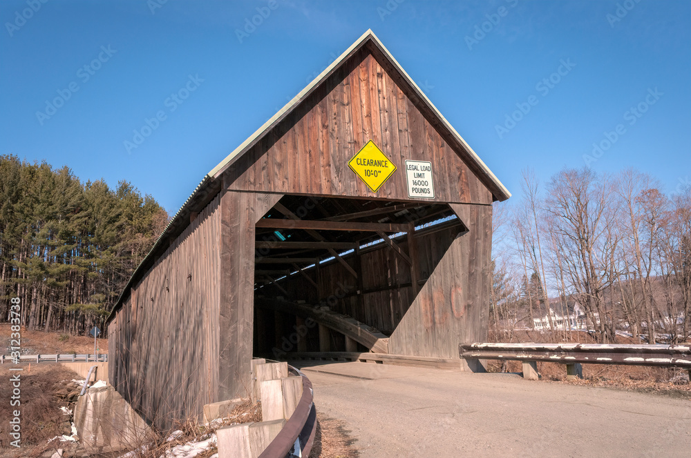 The Lincoln Covered Bridge, known for its unusual green roof, located ...
