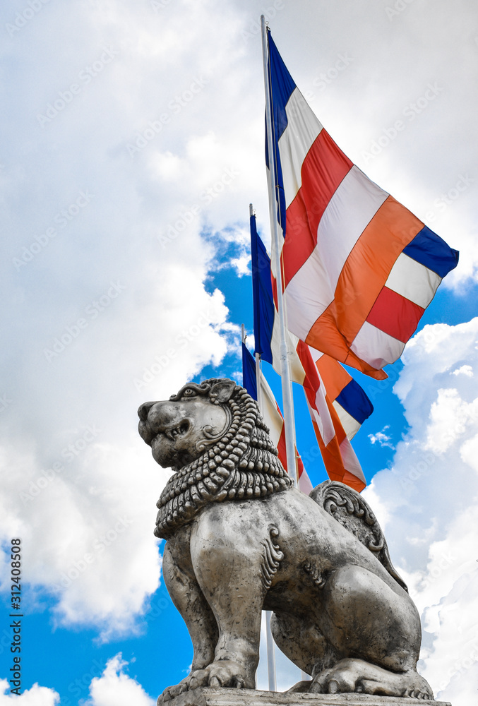 Brave Lion Posture sitting Statue in Silver with Buddhist flags in ...