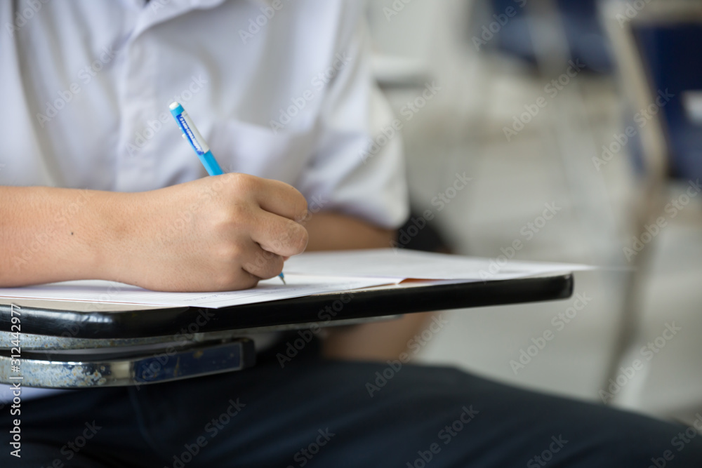 high school,university student study.hands holding pencil writing paper ...