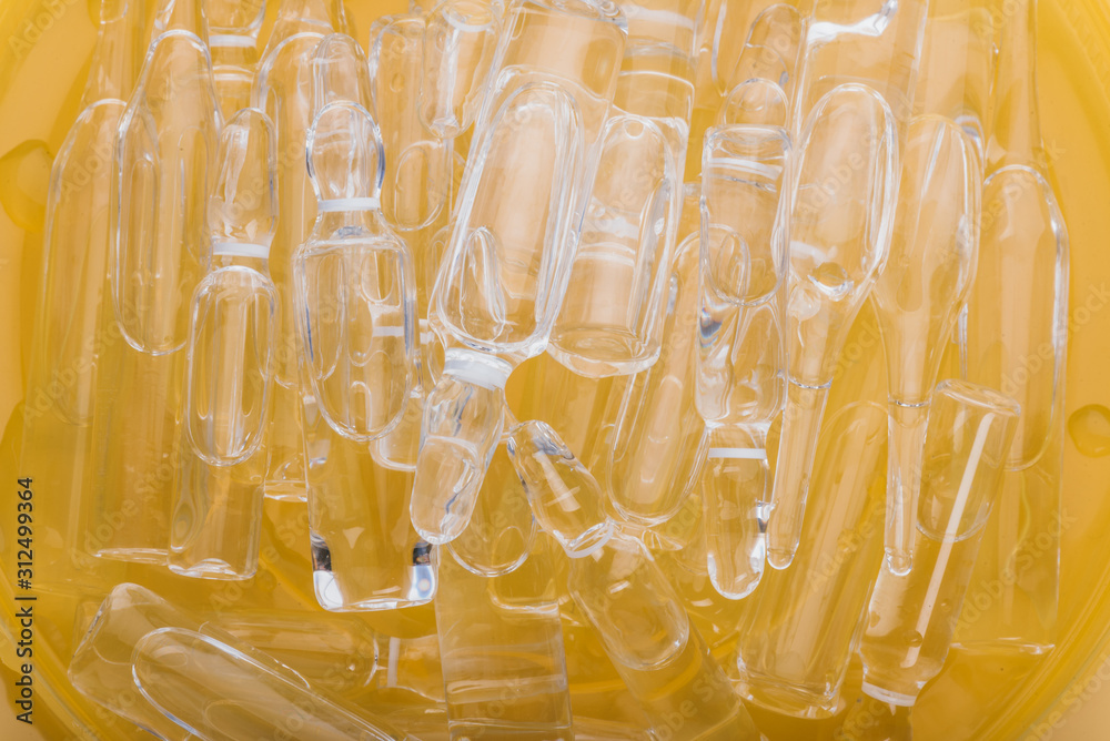 Glass medical ampoule vial for injection. Medicine is liquid sodium ...