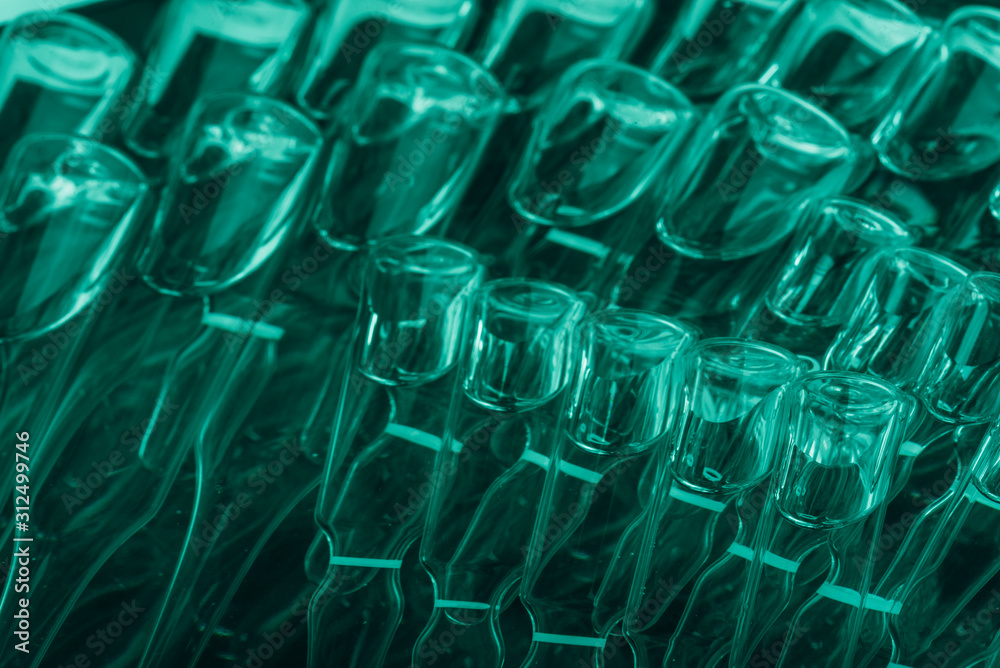 Glass medical ampoule vial for injection. Medicine is liquid sodium ...