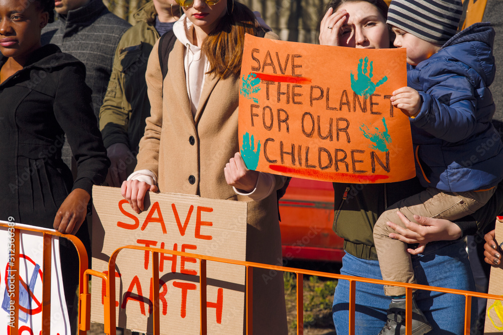 Group of people protesting against pollution Stock Photo | Adobe Stock