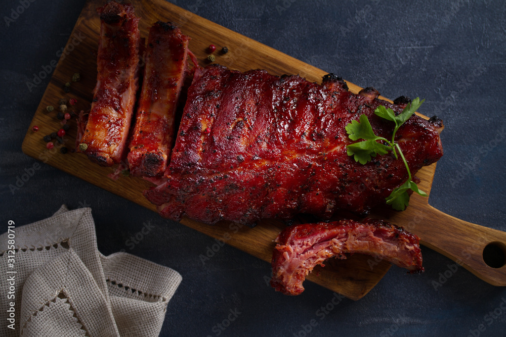 Rack of ribs with barbecue sauce. Overhead horizontal image Stock Photo ...
