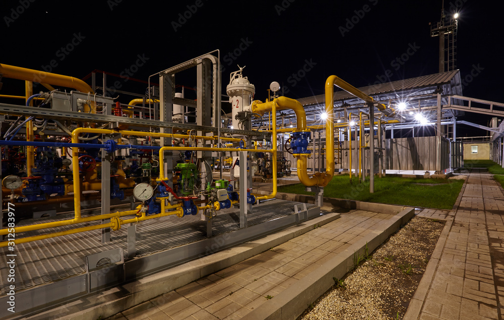Pipeline system at a gas production and processing plant. Pipes, valves ...