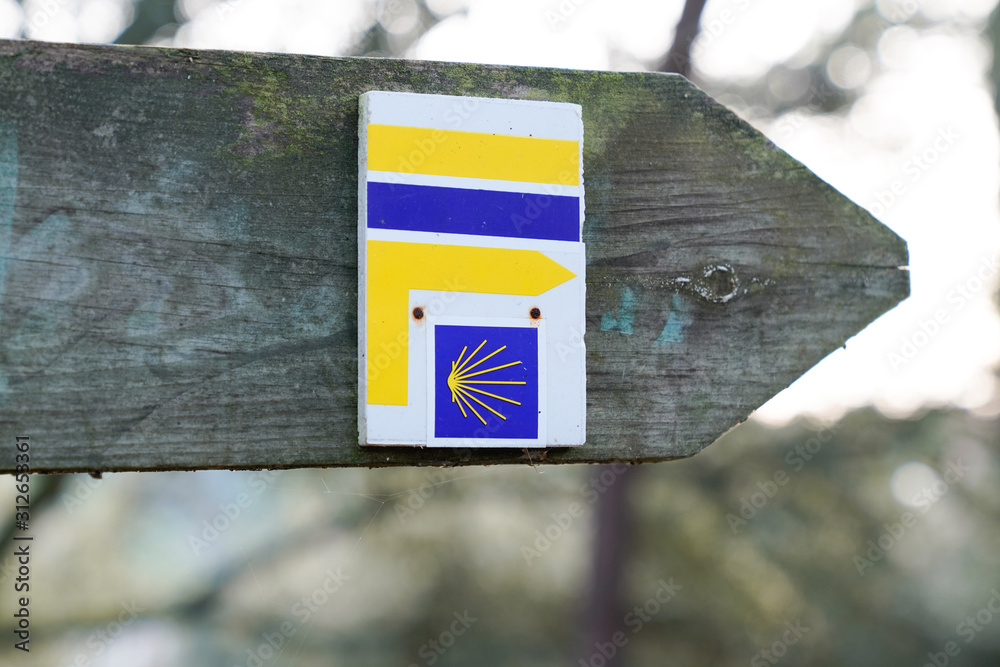 Shell sign and arrow of ancient the Camino de Santiago popular routes ...