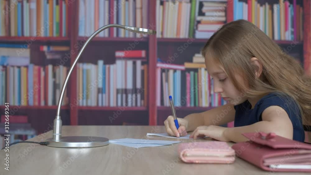 Student girl writing by pen on paper sheet on bookcase background. Girl ...
