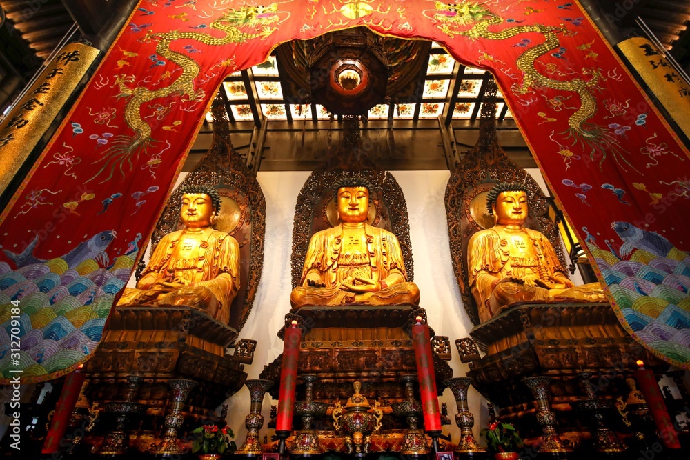 swastika Standing Buddha figure with a left facing swastika on his ...